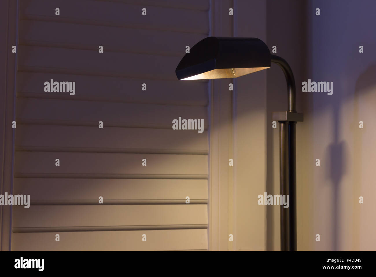 Modern lamp design on white wood background Stock Photo - Alamy