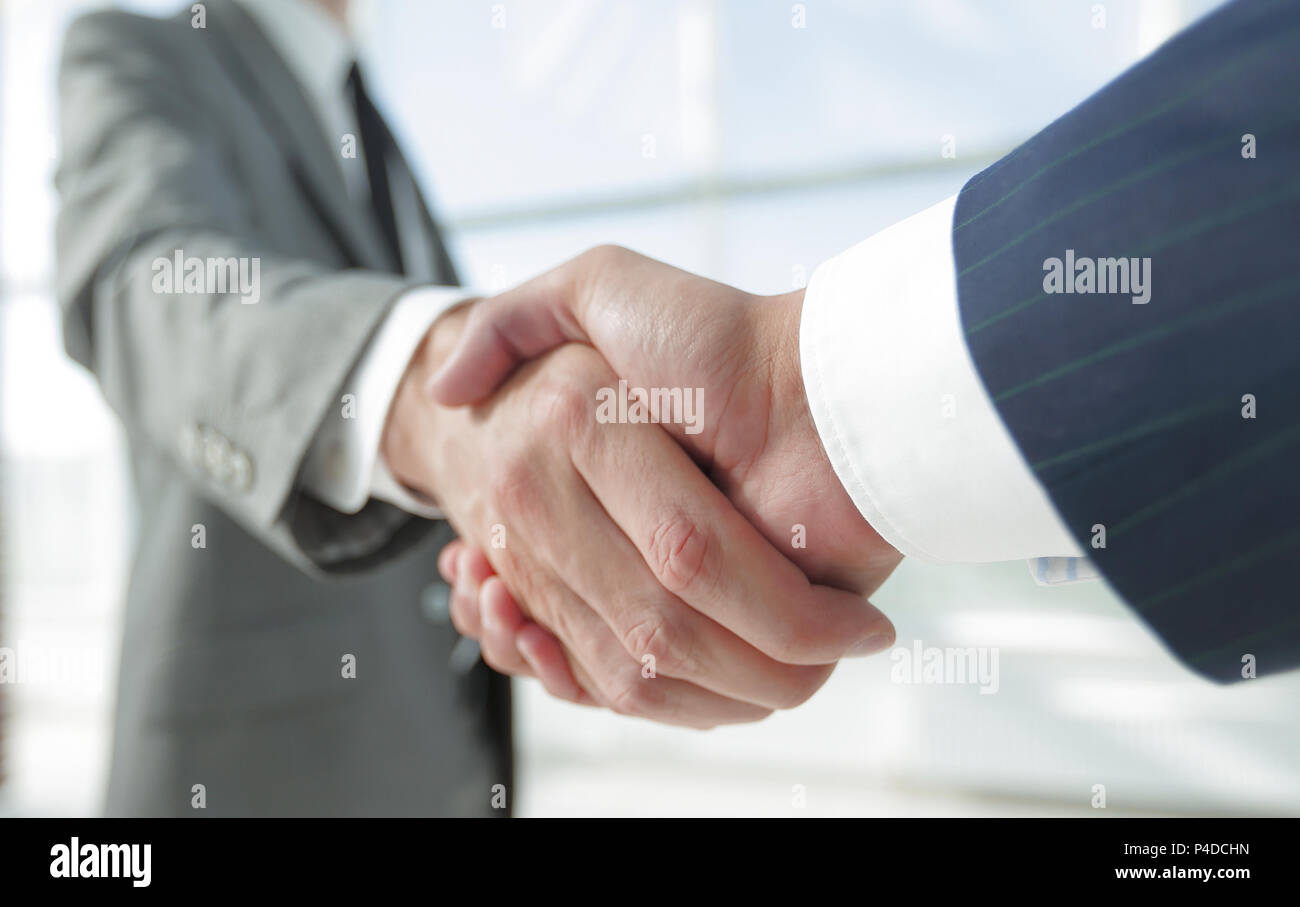 Diverse male friends shaking hands hi-res stock photography and images ...