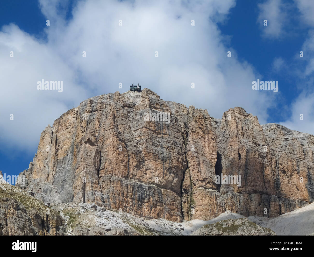 Looking up into the cable car platform part of the Dolomite range of ...