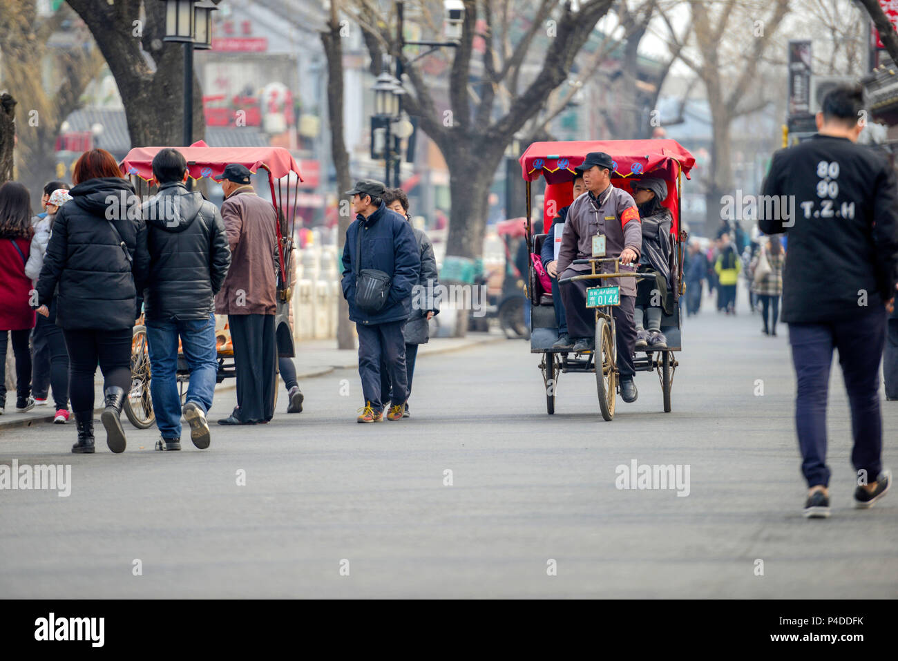 Tour by rickshaw in hutong hi-res stock photography and images - Alamy