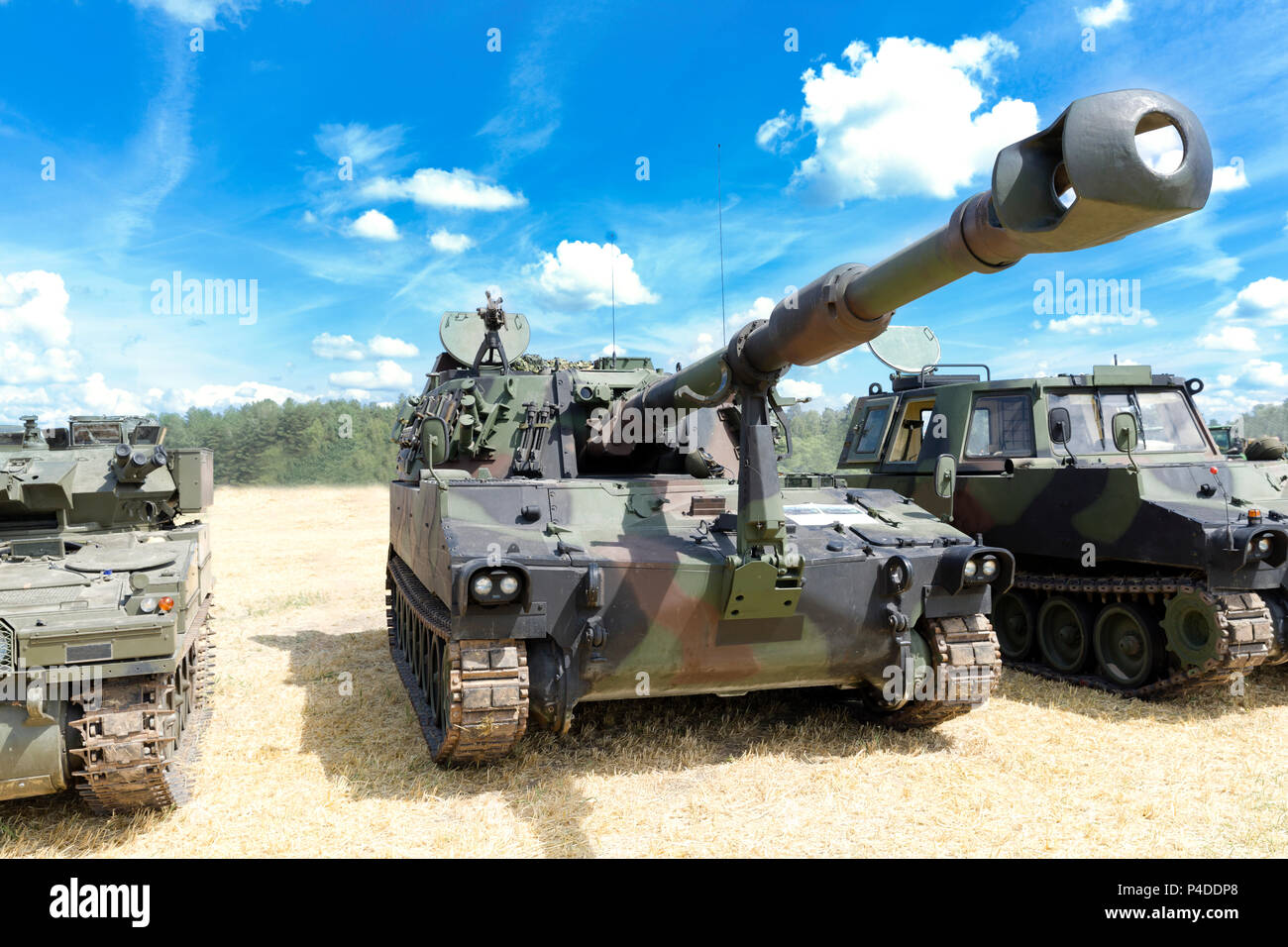Heavy military equipment exhibition. Army tank with guns Stock Photo ...