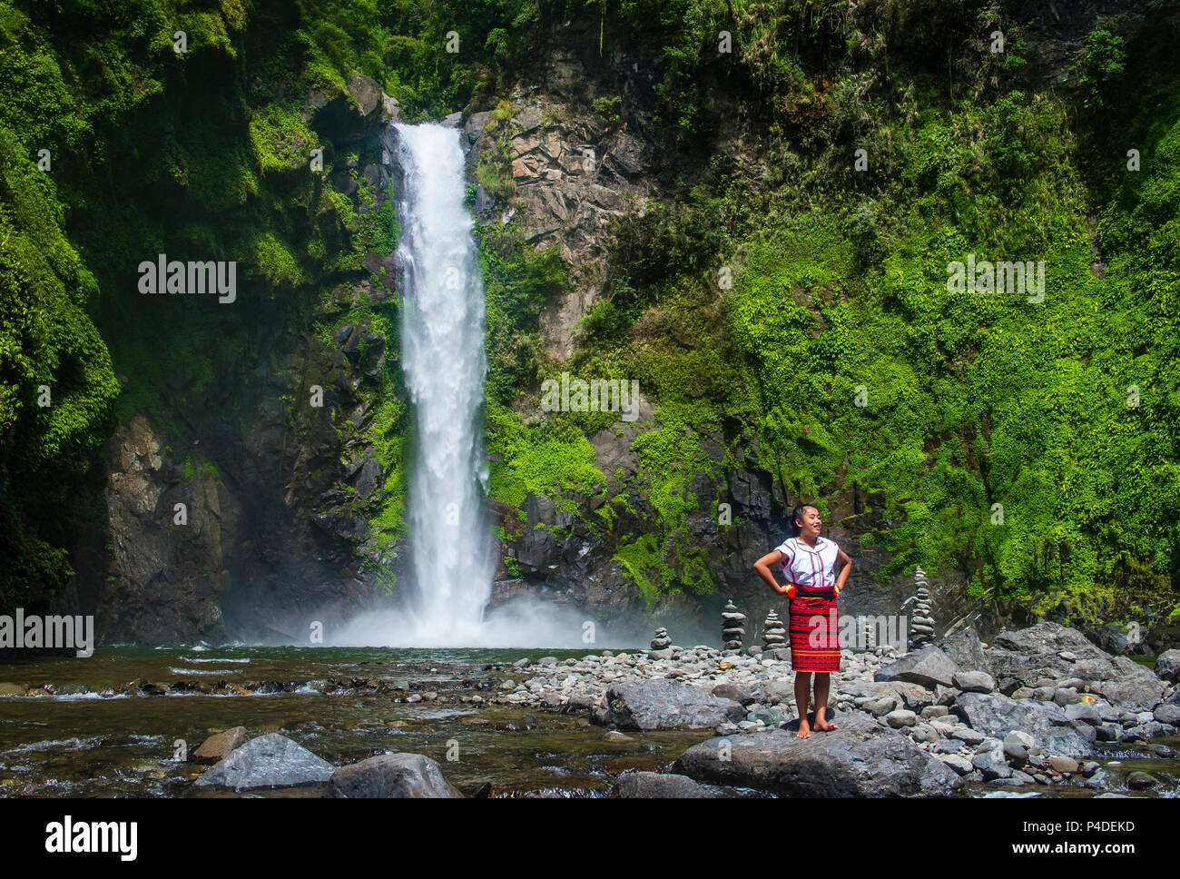 Girl from Ifugao Minority near a waterfall in Batad the Philippines ...