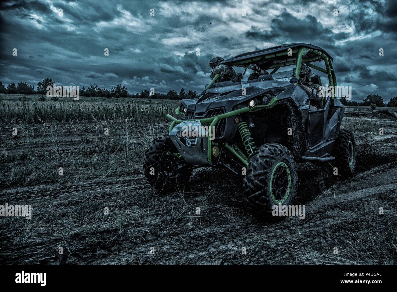 Army rangers moving on military buggy at night Stock Photo - Alamy