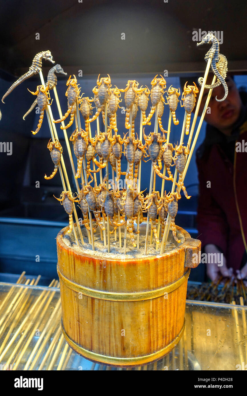 BEIJING, CHINA - MARCH 11, 2016: Fried scorpions and seahorses on ...