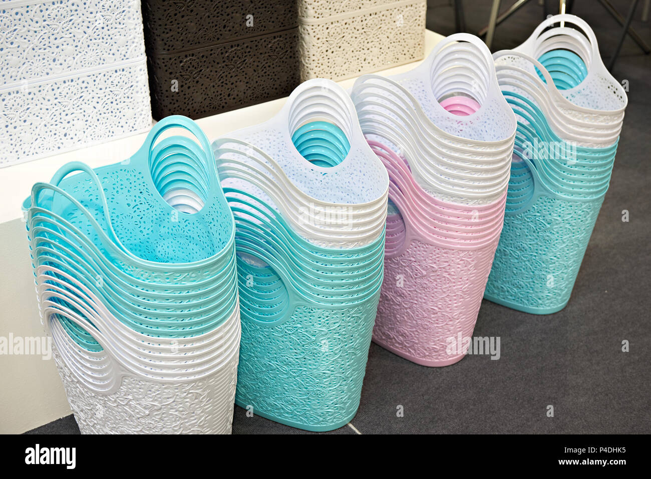 Plastic laundry baskets in the store Stock Photo - Alamy