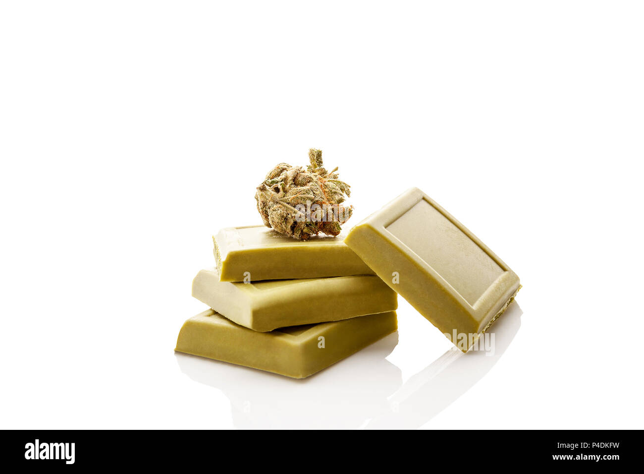 Marijuana chocolate blocks with ganja bud isolated on white background ...