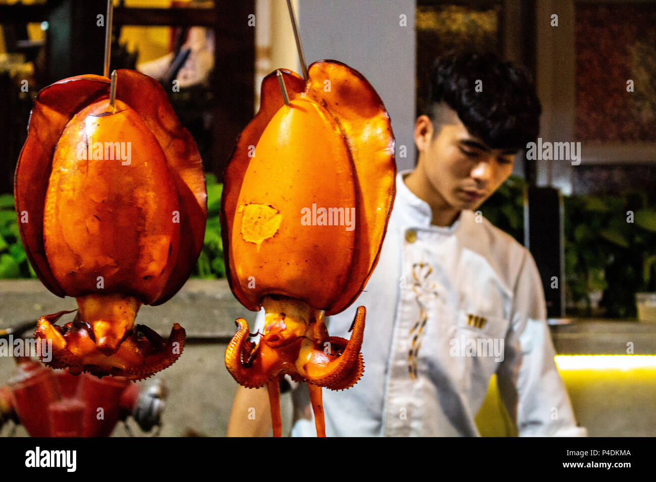 Hanoi, Vietnam - March 15, 2018: Grilled cuttlefish exposed in a night ...