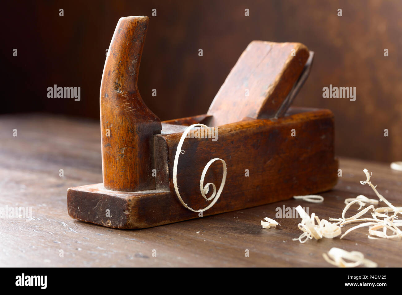 Old wooden planer on the table in the workshop Stock Photo - Alamy