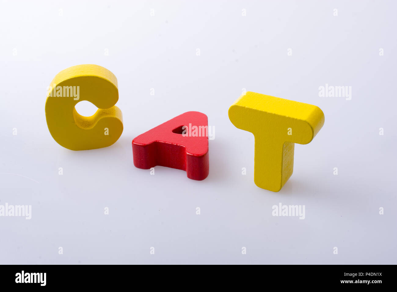 the word CAT written with colorful letter blocks Stock Photo - Alamy