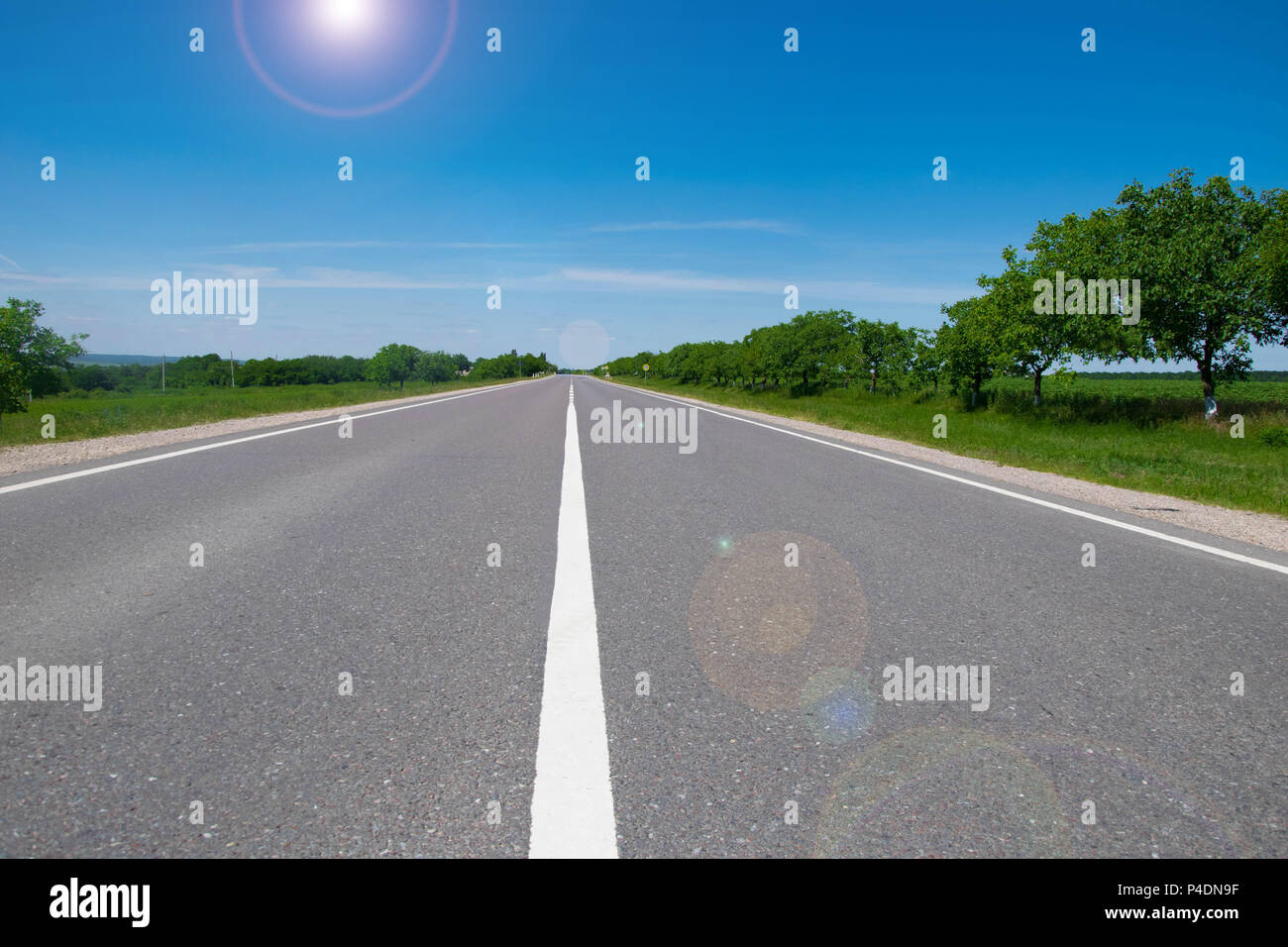Car driver perspective on road in summer and winter Stock Photo - Alamy
