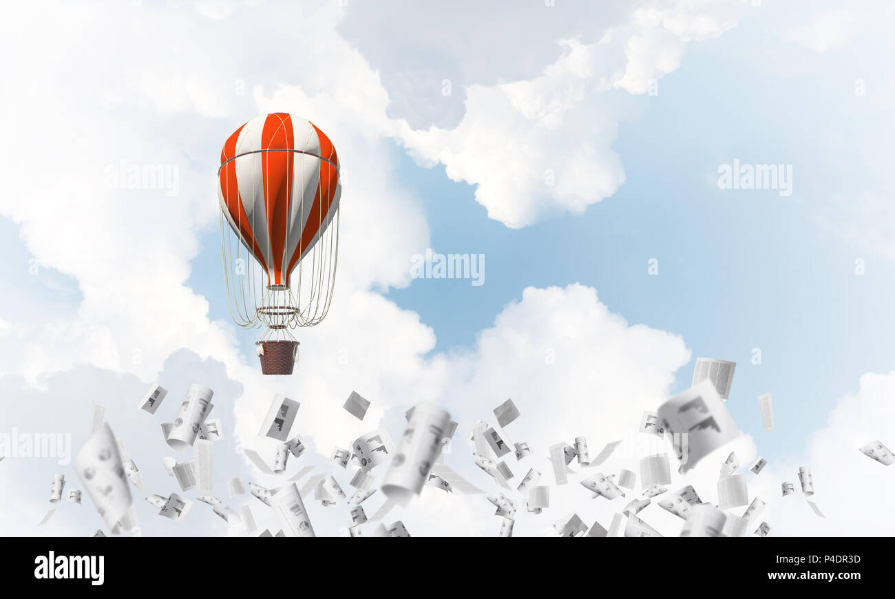 Flying hot air balloon in the air Stock Photo - Alamy