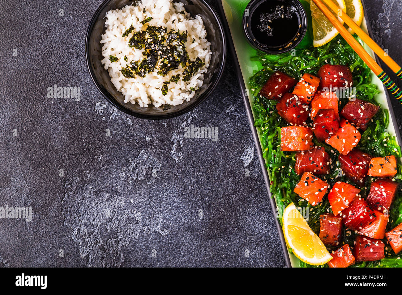 Poke, traditional Hawaiian raw fish salad, top view Stock Photo - Alamy