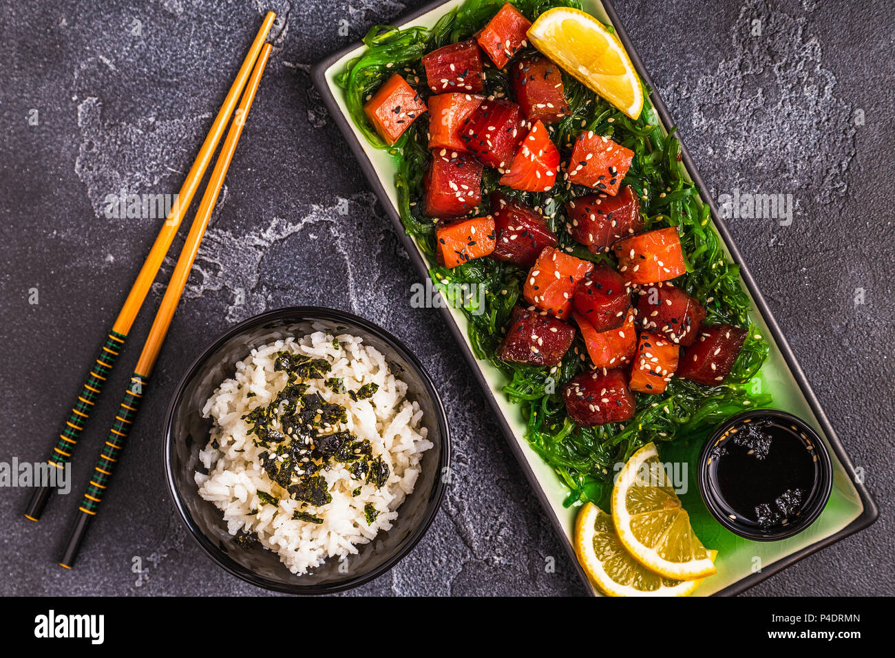 Poke, traditional Hawaiian raw fish salad, top view Stock Photo - Alamy