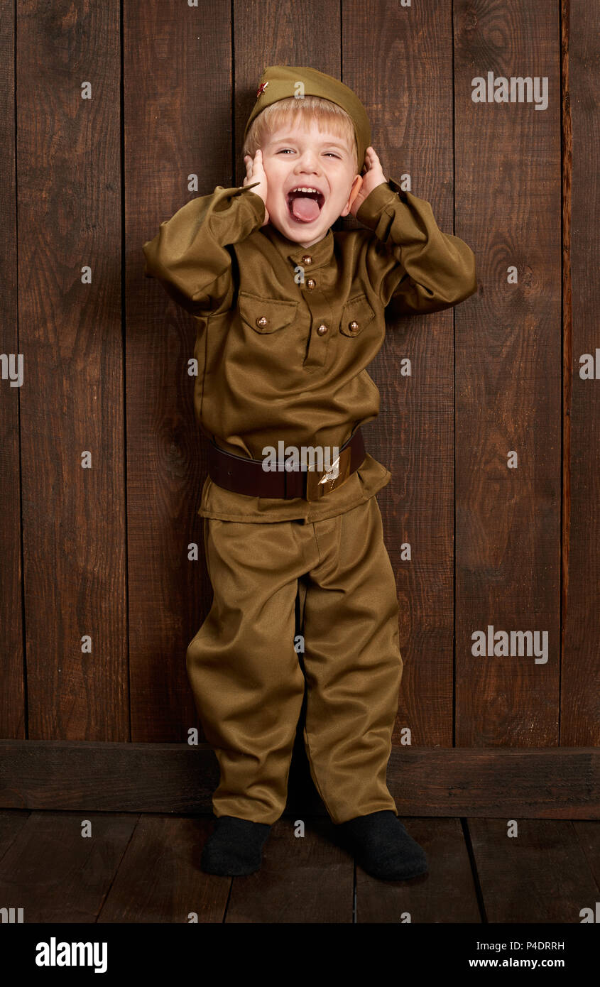 children are dressed as soldier in retro military uniforms Stock Photo ...