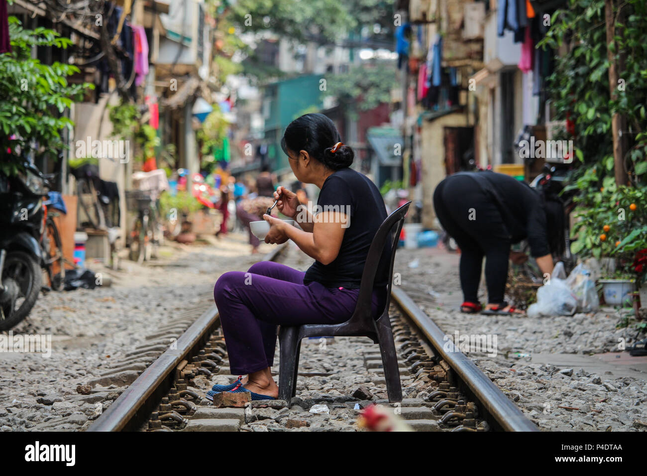 Hanoi, Vietnam - March 15, 2018: People living their daily life in the ...