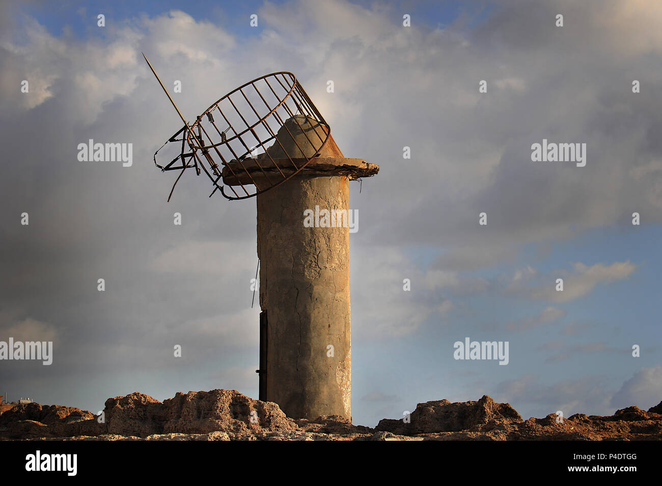 A ruined lighthouse in the coastal town of Batroun, Lebanon Stock Photo ...