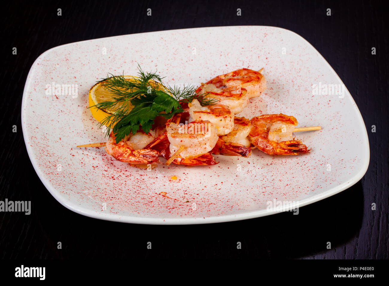 Tasty tiger prawn with garlic sauce Stock Photo - Alamy