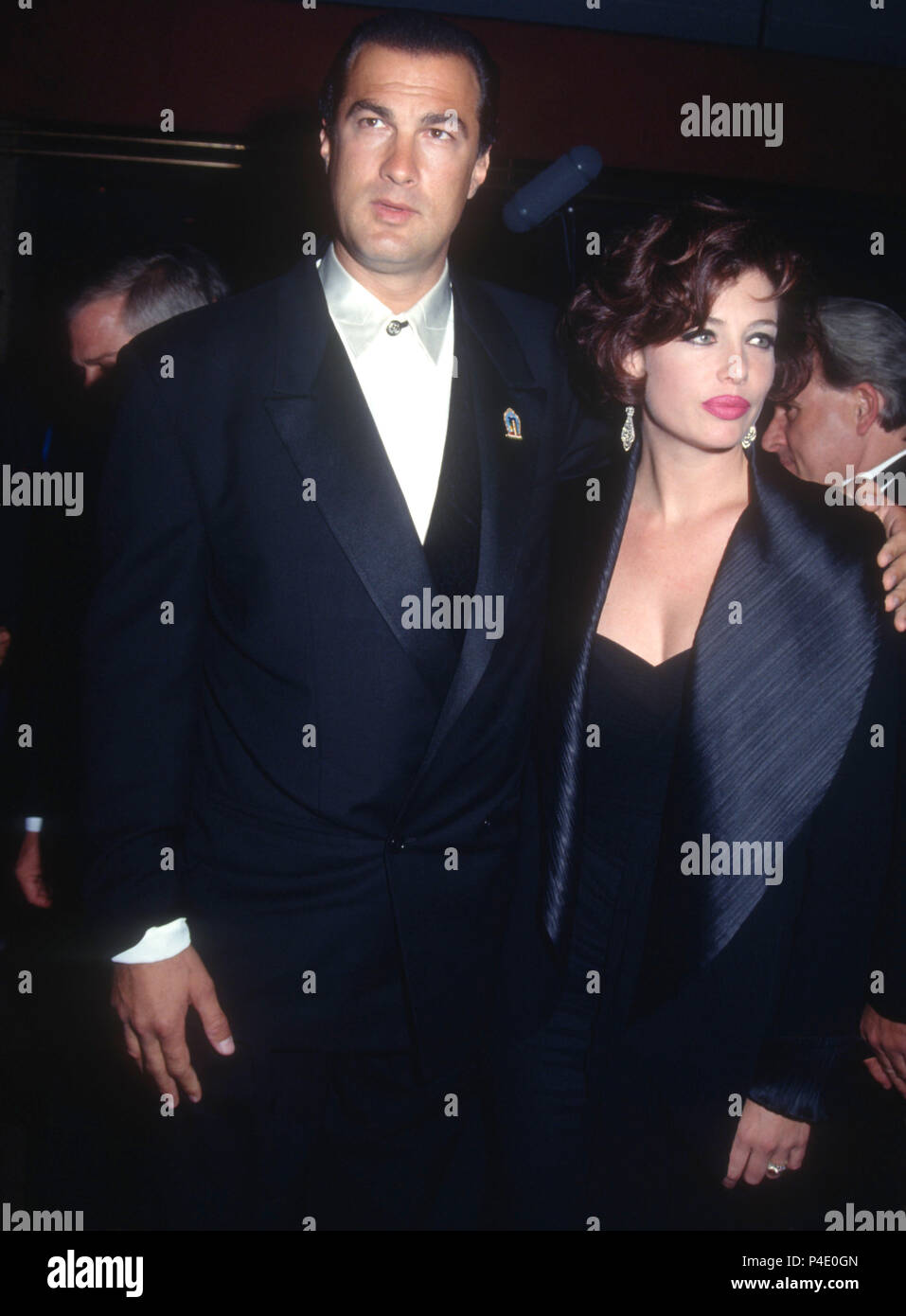 LOS ANGELES, CA - NOVEMBER 16: (L-R) Actor Steven Seagal and actress ...