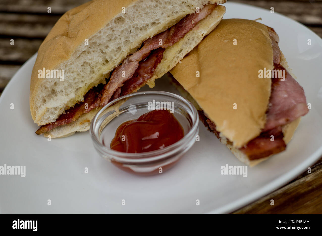 Bacon sandwich. Bacon bun. Best way to start the day Stock Photo - Alamy