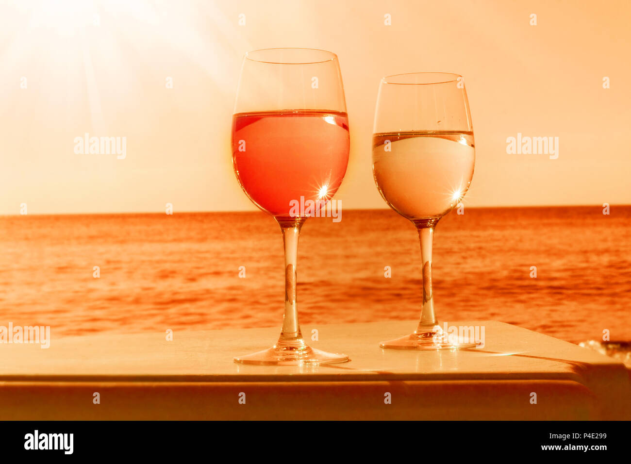 Yellow two cocktail glasses hi-res stock photography and images - Alamy