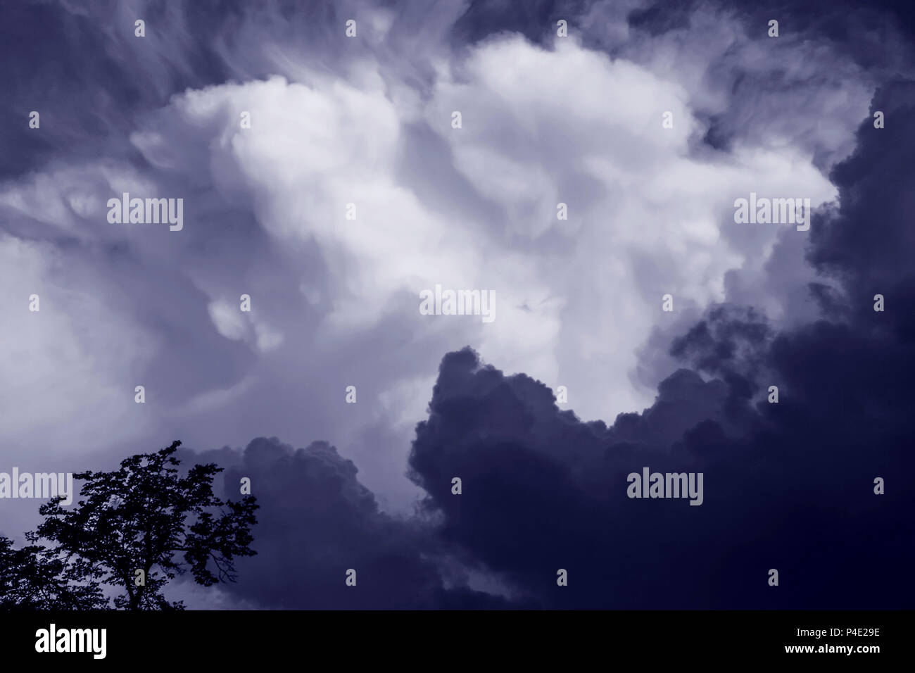 Dark blue clouds hi-res stock photography and images - Alamy