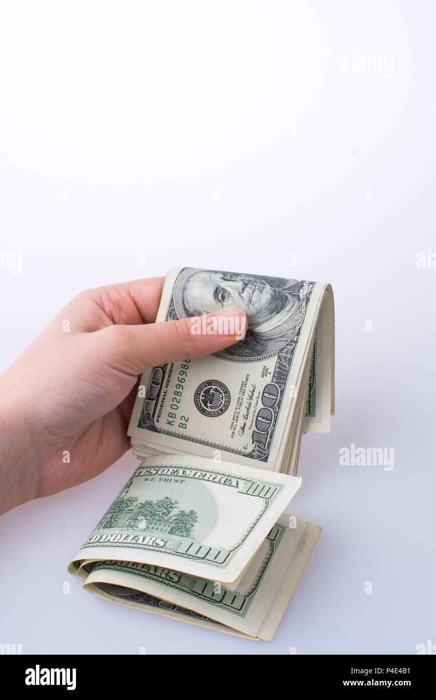 Human hand holding American dollar bill as money isolated on white ...