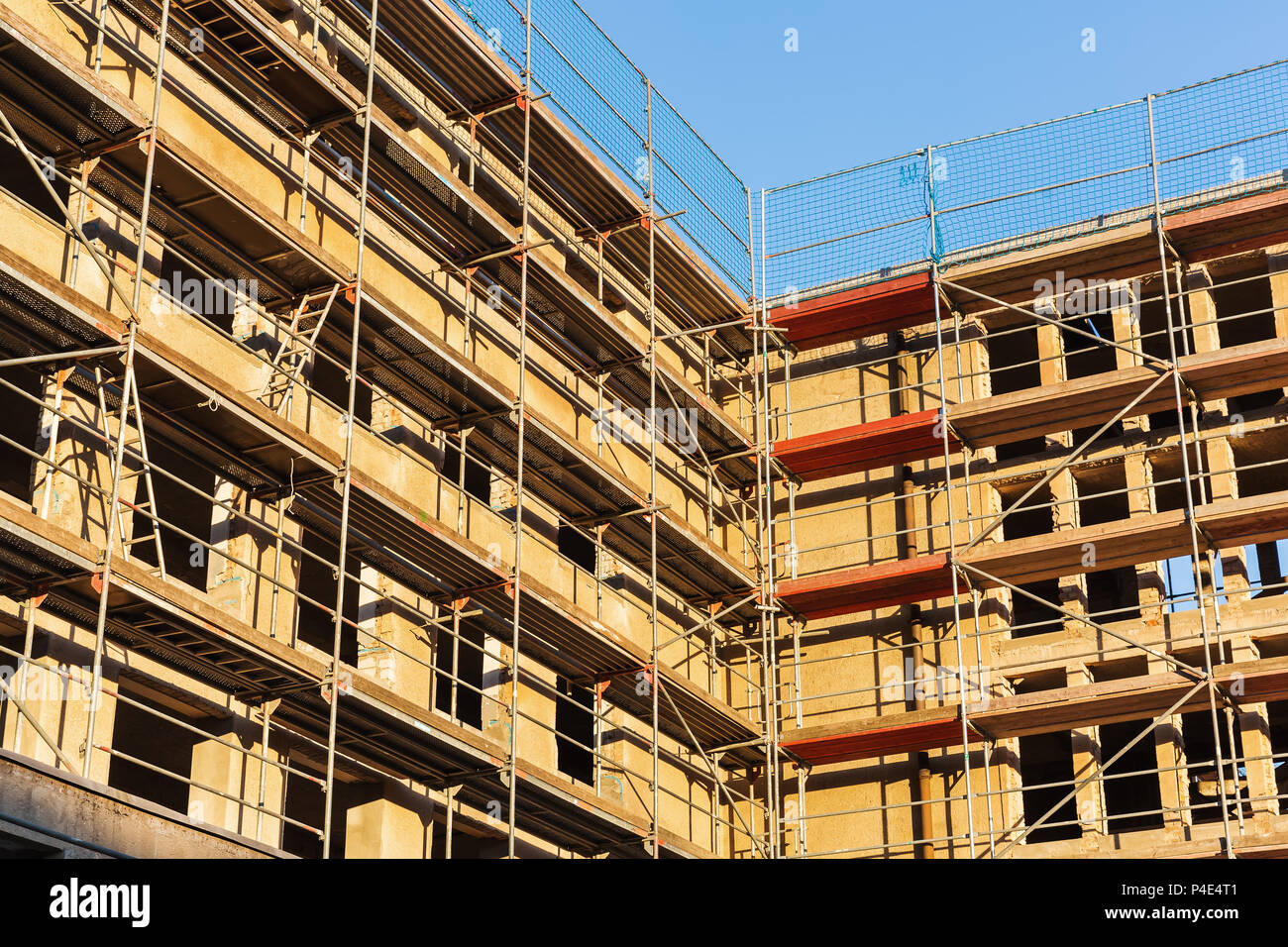 picture of a building construction site with scaffolds Stock Photo - Alamy