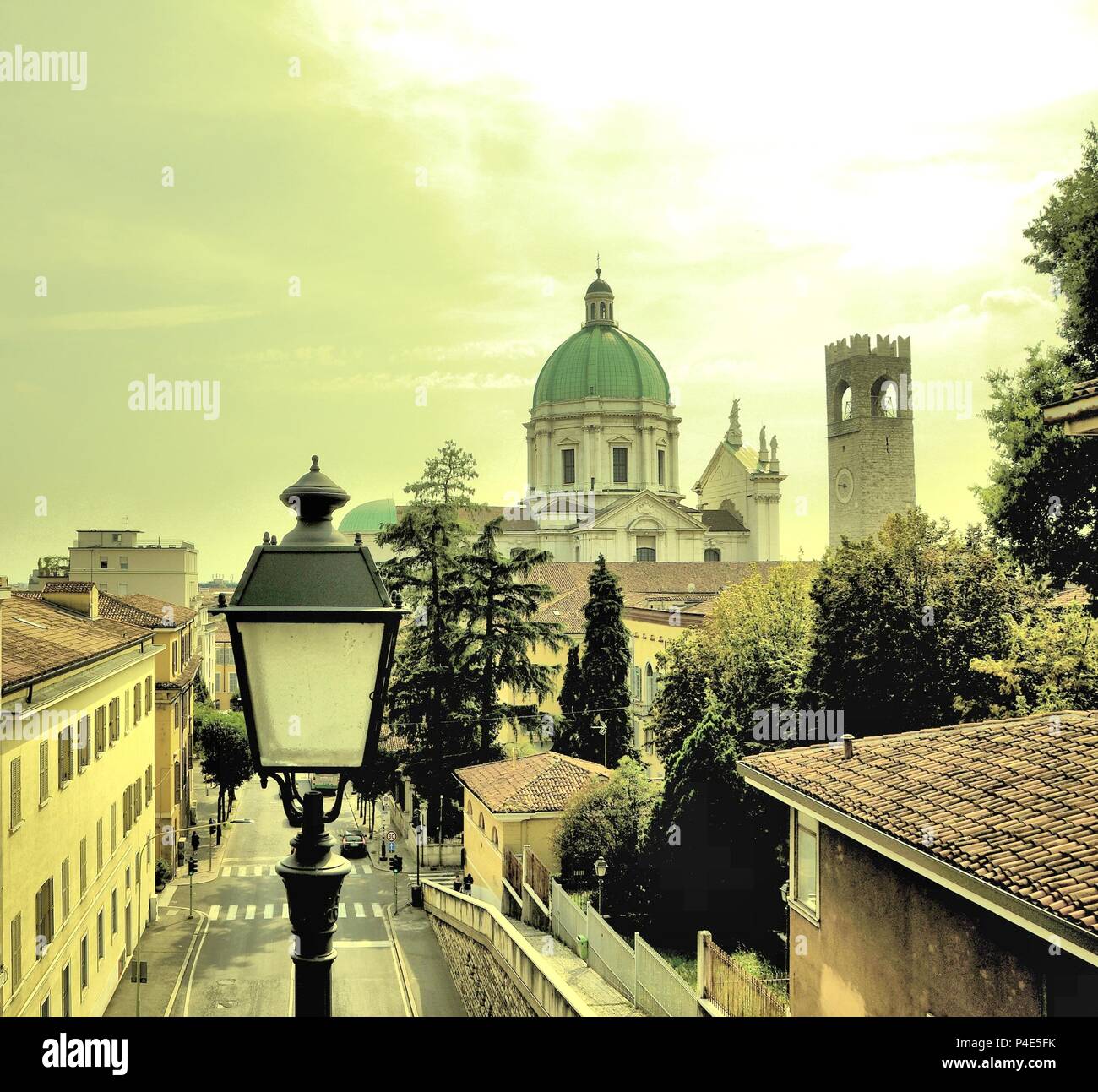 Italian cityscape with baroque dome and medieval tower Stock Photo - Alamy