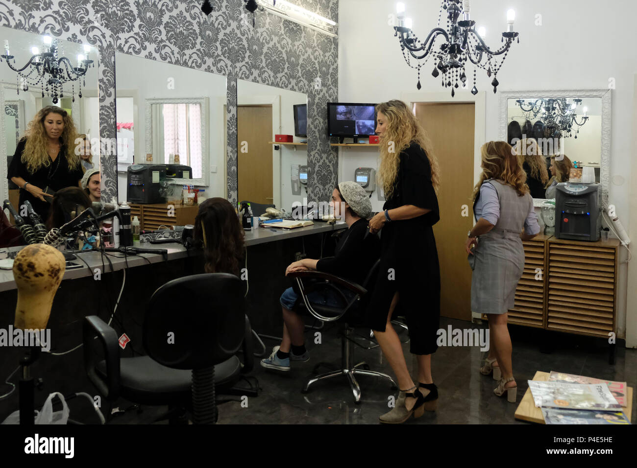 Bnei Brak, Israel. 20th June, 2018. A Haredi woman at the shop of ...