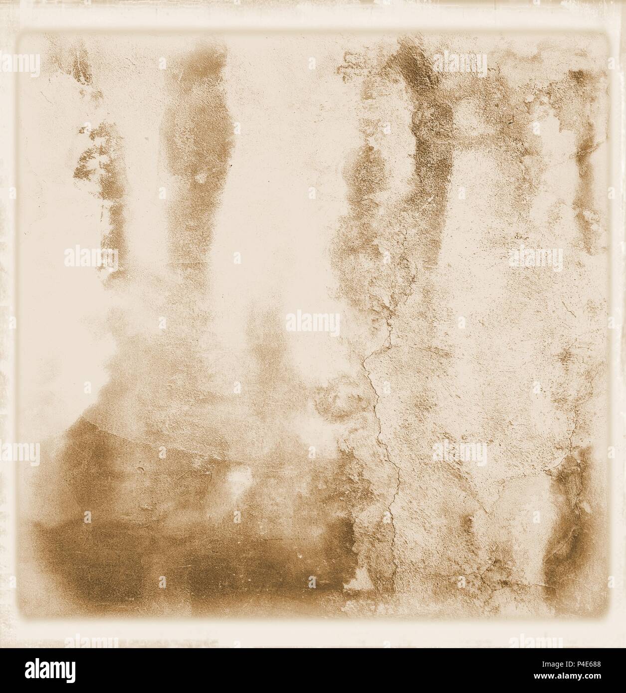 Retro sepia wall surface close up with faded borders for texture or ...