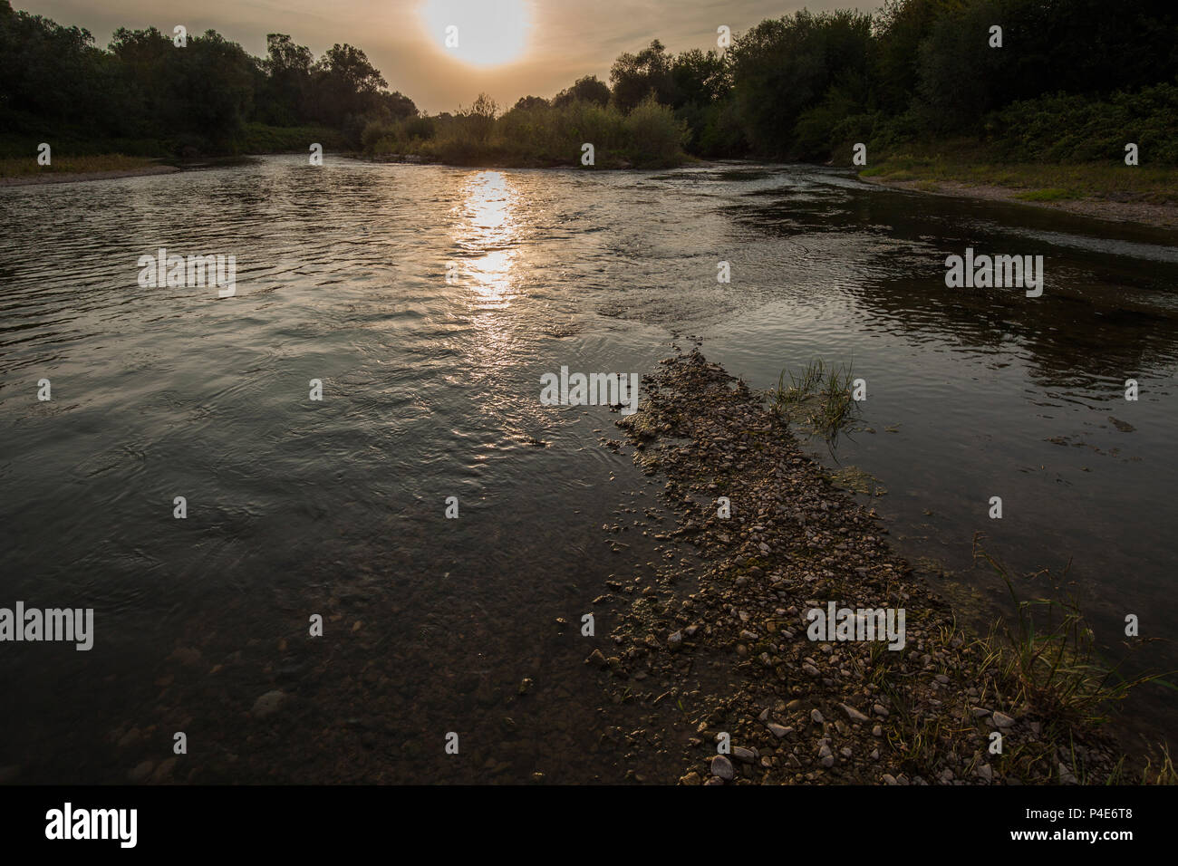 Sunset sky over the river Stock Photo - Alamy