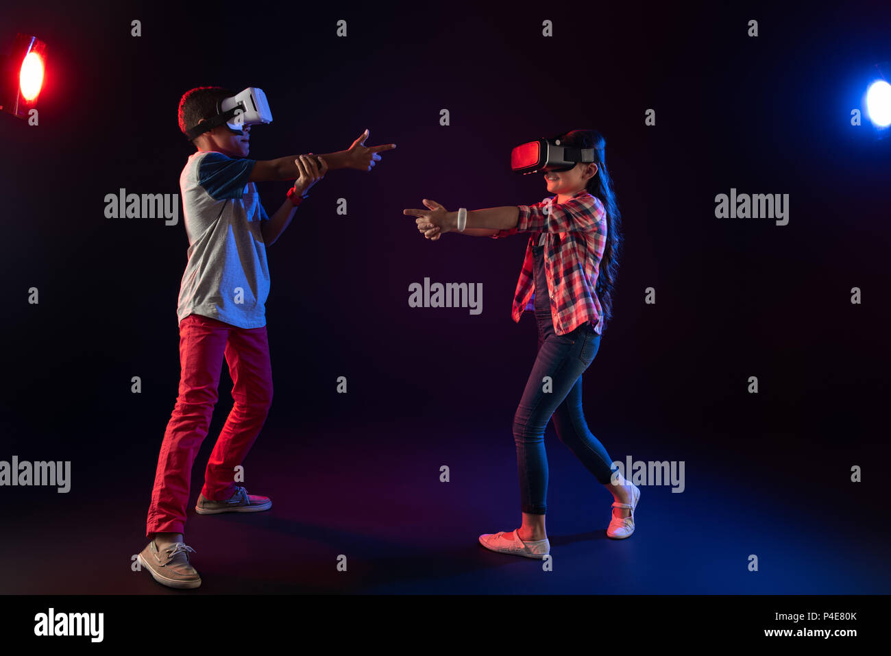 Excited best friends playing VR games Stock Photo - Alamy