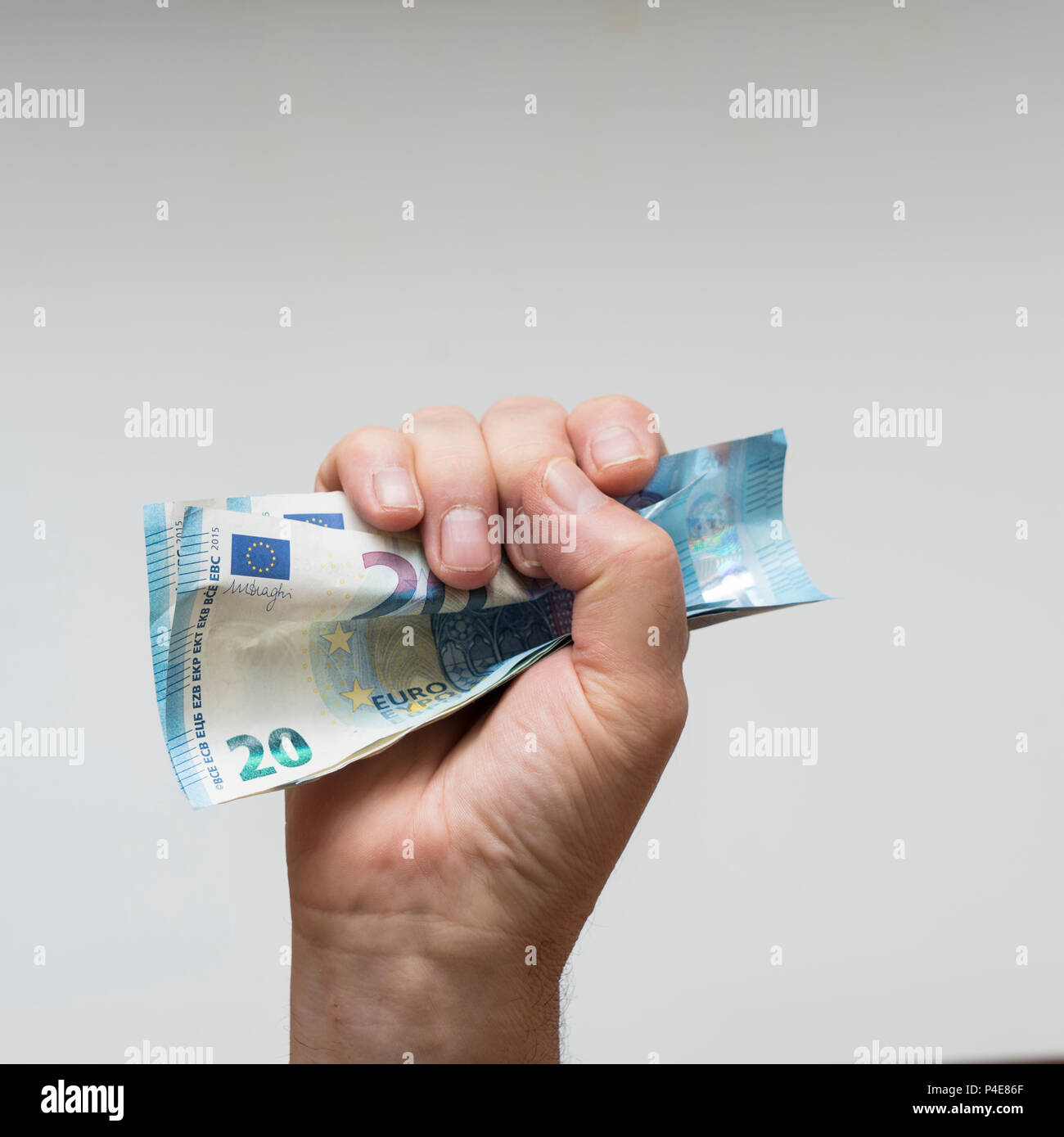 Euro in hand hi-res stock photography and images - Alamy