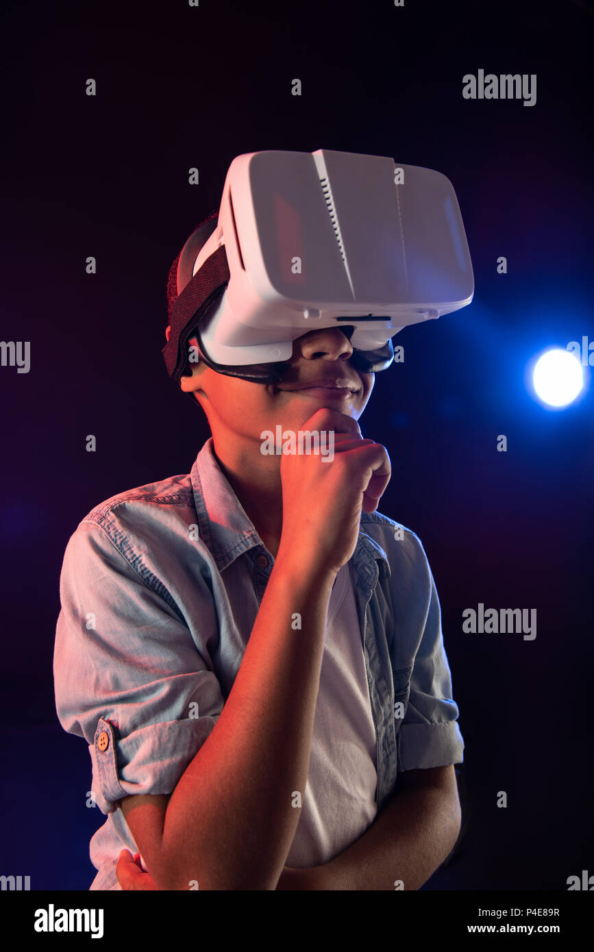 Happy teenager wearing a modern VR headset Stock Photo - Alamy