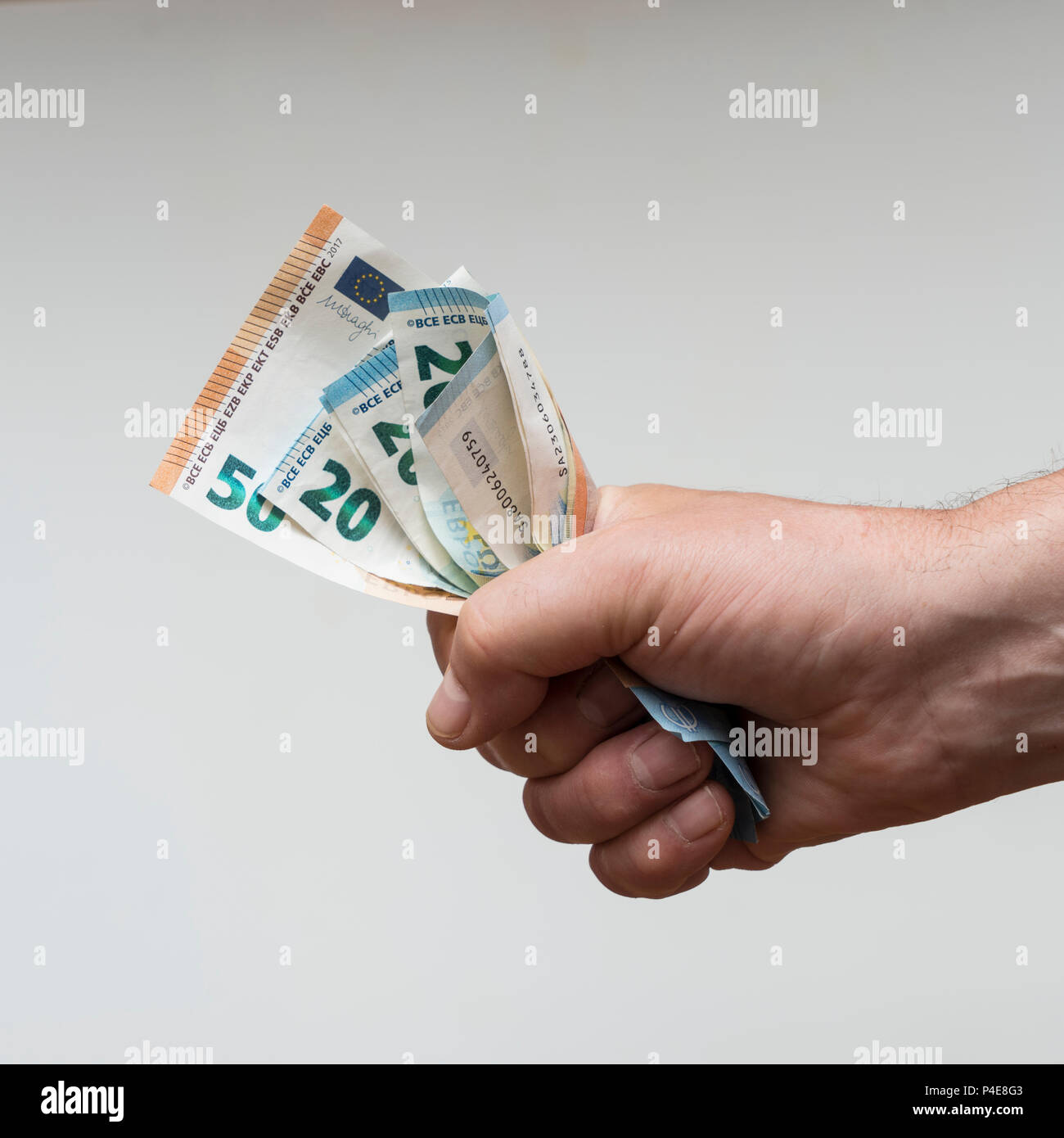 Hand money euro hi-res stock photography and images - Alamy