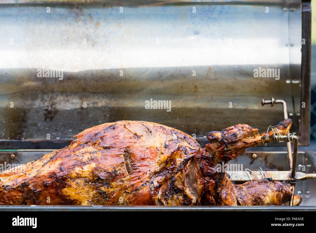 BBQ Cookout Lamb on the spit rotisserie or Spit Braai as it's known in ...