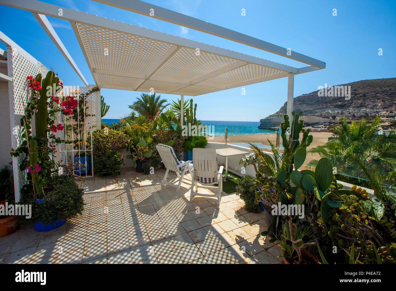 View on a Spanish beach from a roof garden Stock Photo - Alamy