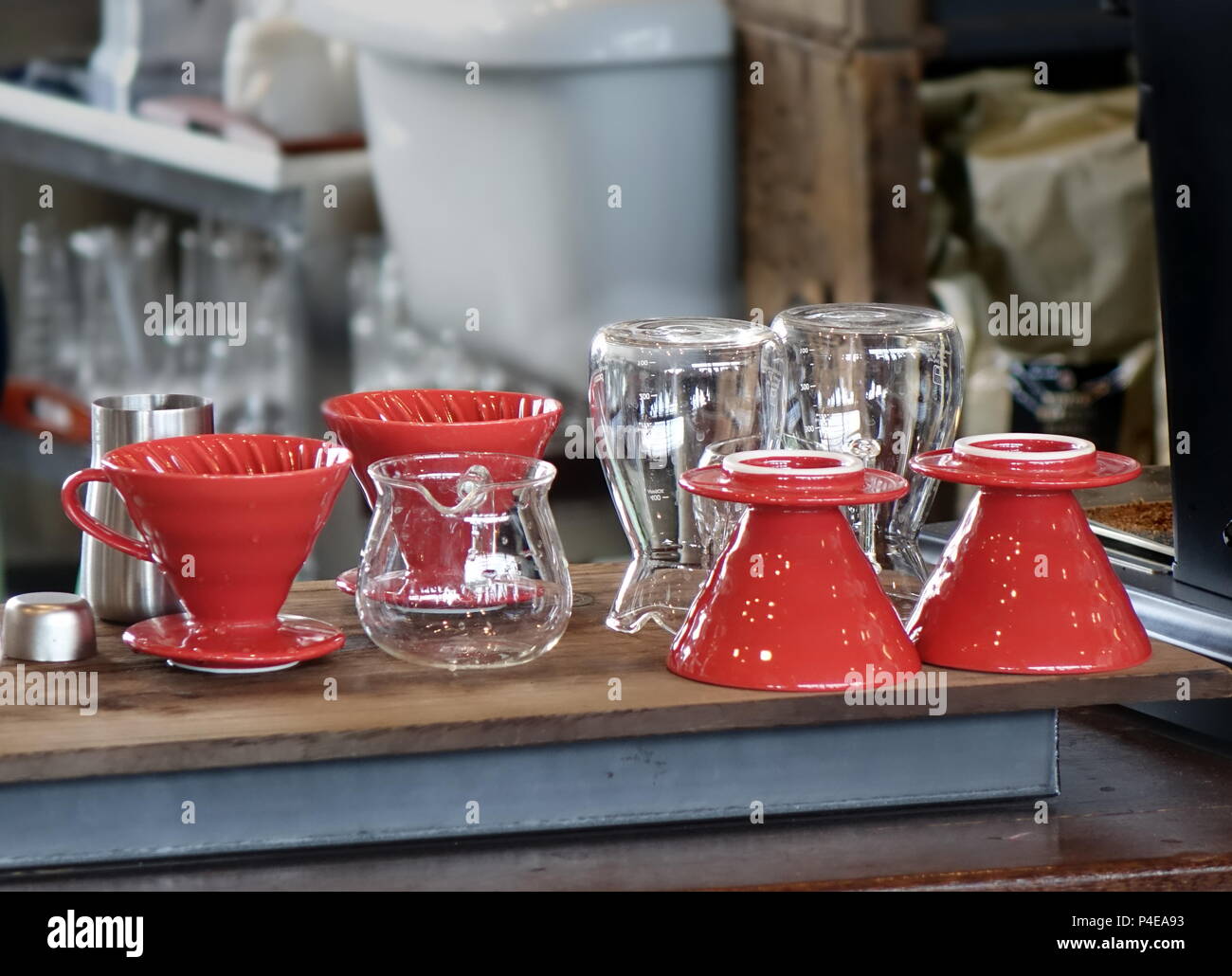 Coffee making filters and glass jars on a counter Stock Photo - Alamy
