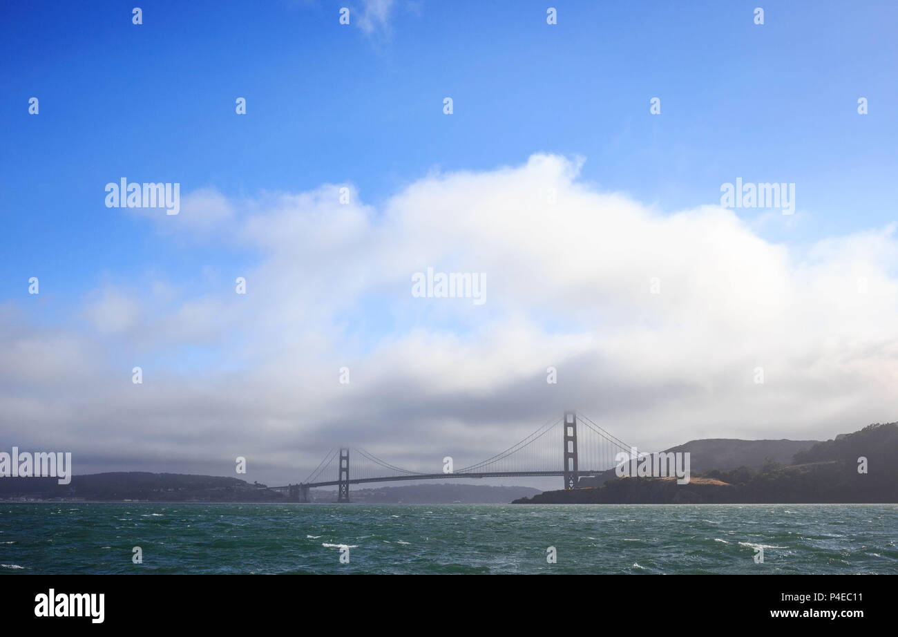 View of the Golden Gate Bridge under fog from the water Stock Photo - Alamy