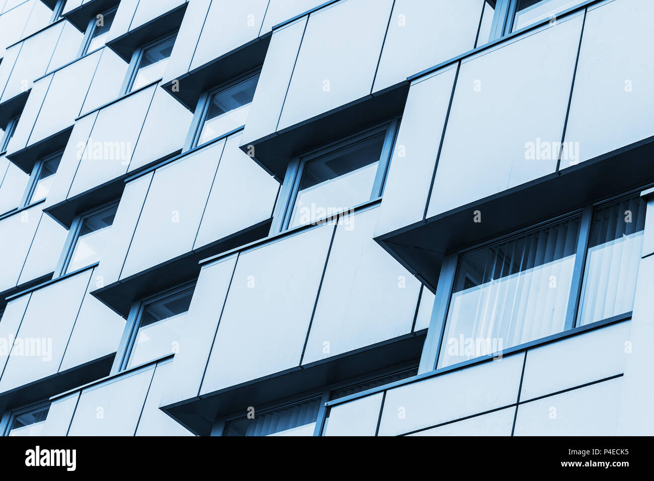 Abstract fragment of modern architecture, walls made steel with shiny ...