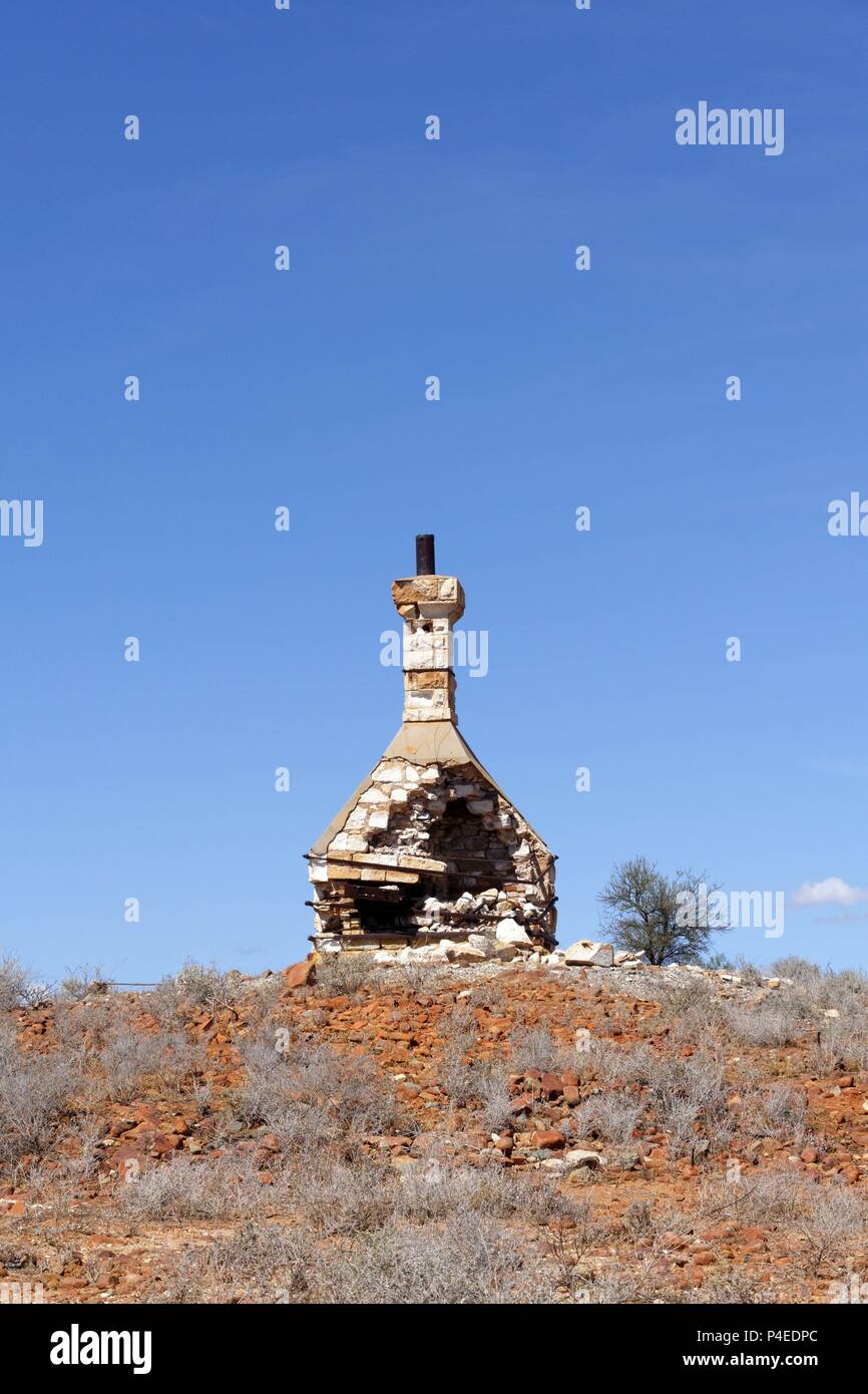 Ruin of a stone chimney fireplace, the remains of the Cue hospital ...