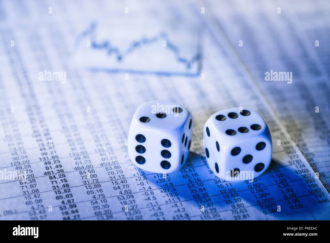 Two dice on a chart with stock prices | usage worldwide Stock Photo - Alamy