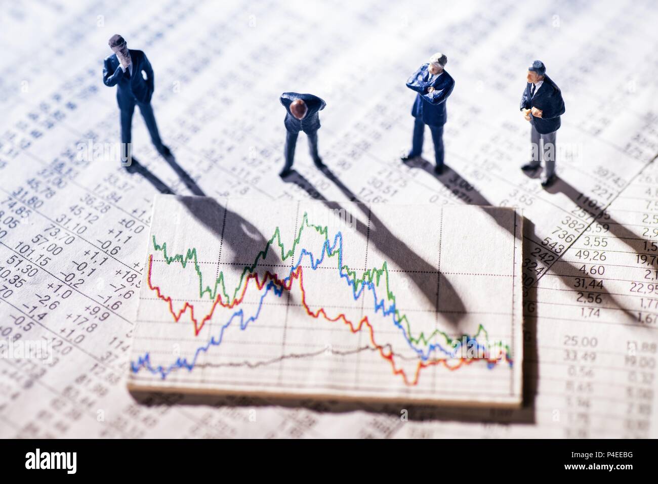 Businessmen are skeptical looking at stock market charts. | usage ...