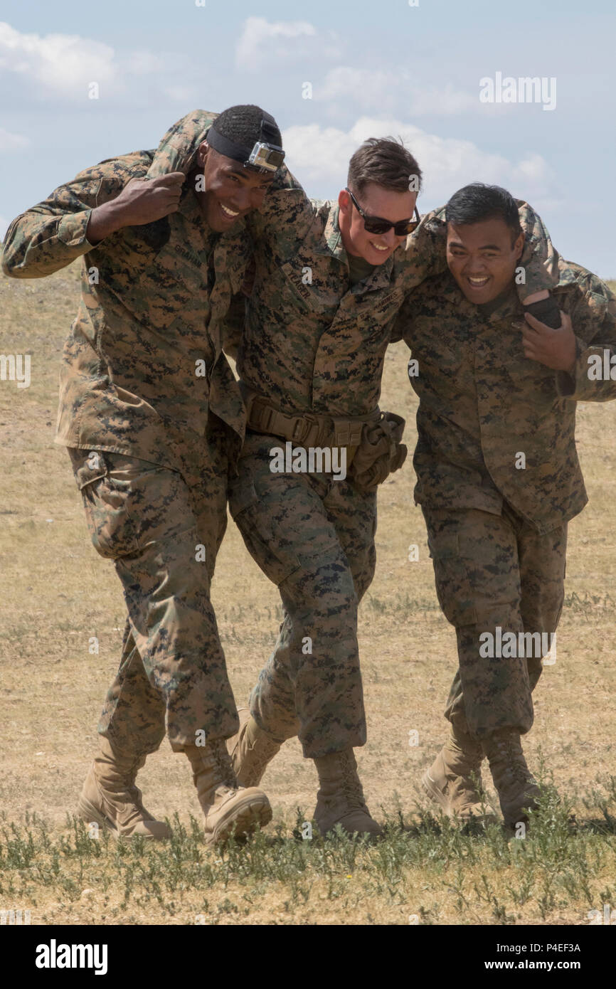 U.S. Navy Hospital Corpsman 2nd Class John Graham (left) and Hospital ...