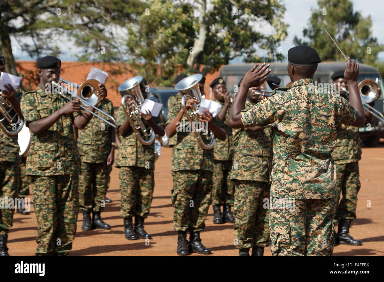 Uganda People’s Defence Force band plays the Ugandan National Anthem at ...