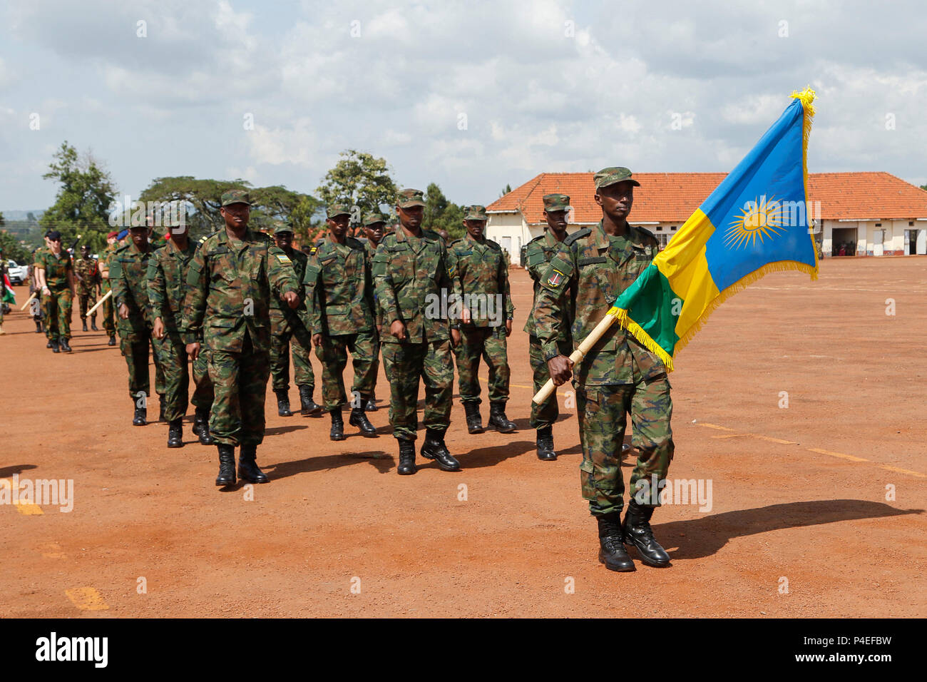 Rwanda Defence Force soldiers march off the parade field to finalize ...