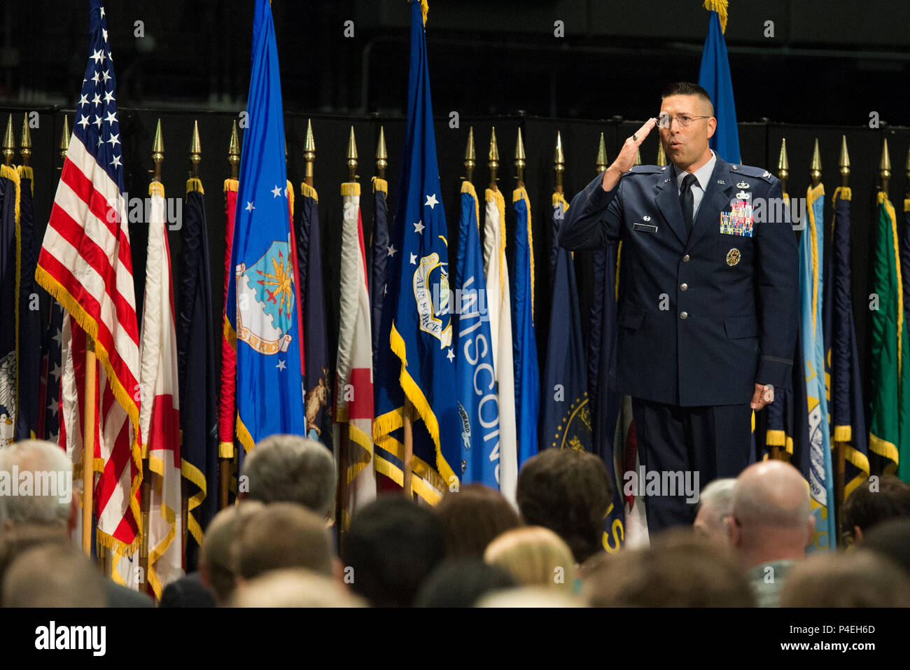 Col. Thomas Sherman, 88th Air Base Wing commander, presents the wing ...