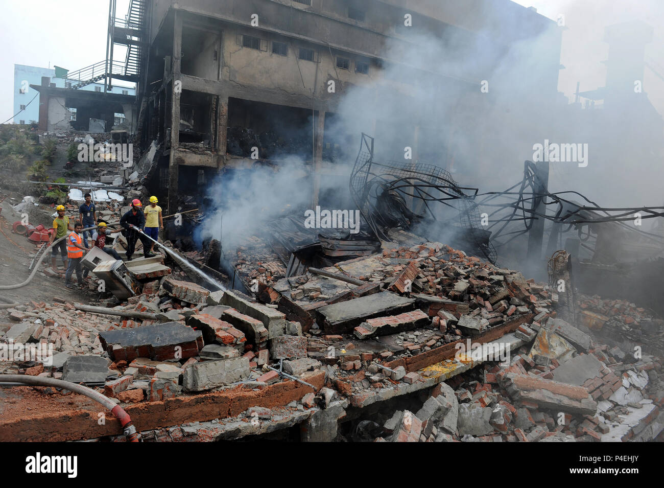 Fire explosion factory people hi-res stock photography and images - Alamy