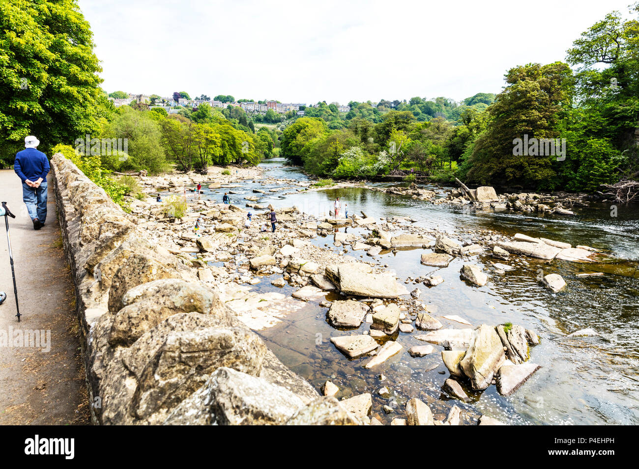 Richmond Yorkshire UK, families playing in River Swale Richmond ...