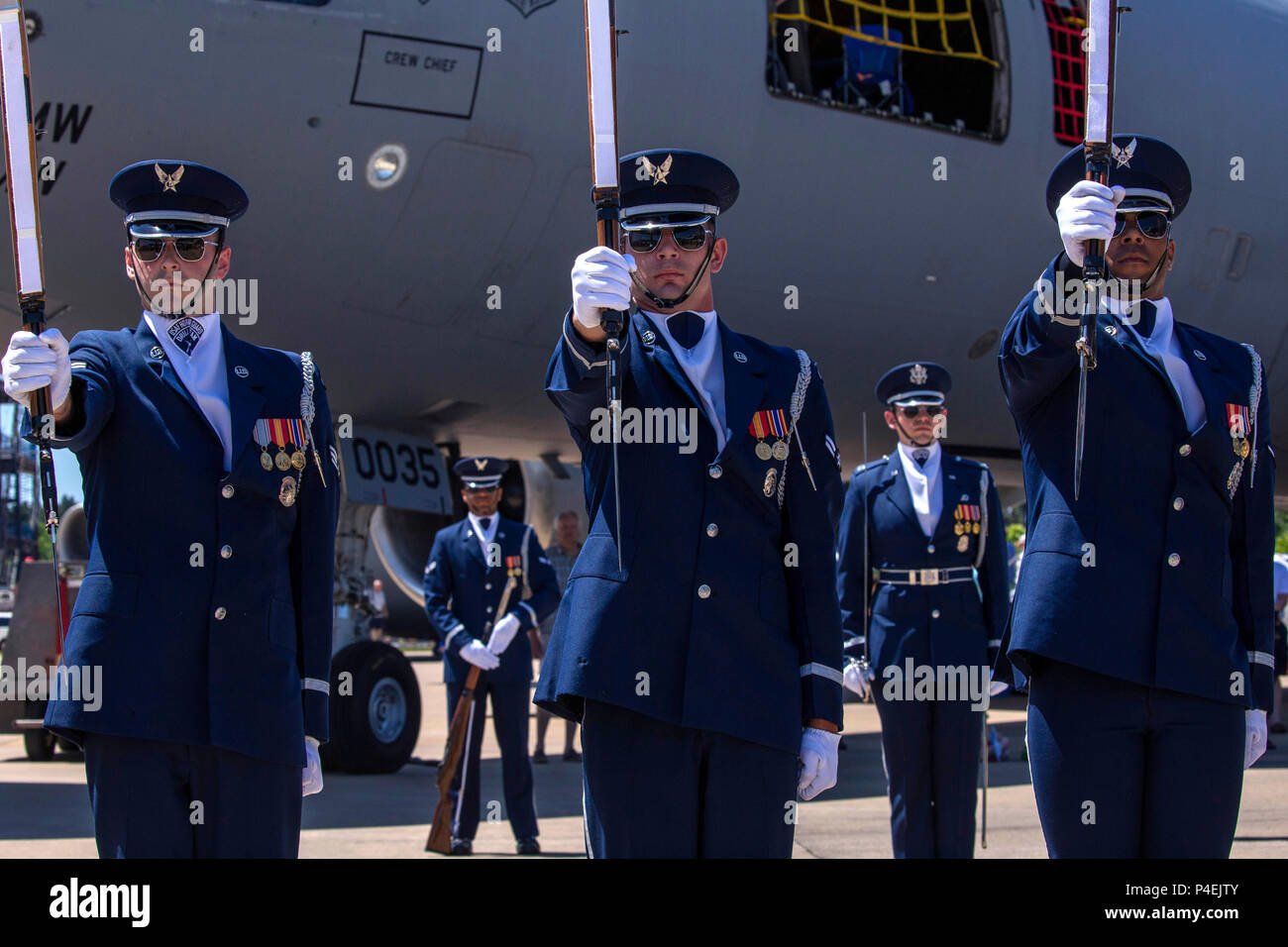 The U.S. Air Force Honor Guard Drill Team performs in front of visitors ...